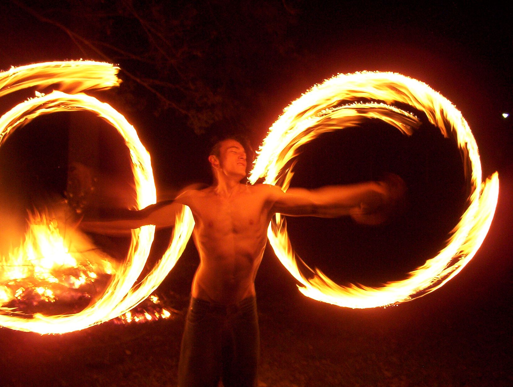 Take Fire Twirling Classes for Fire Dancing - Simply Lavish Weddings